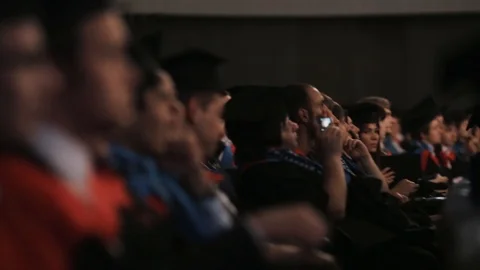 Row of sitting in assembly hall multicul... | Stock Video | Pond5