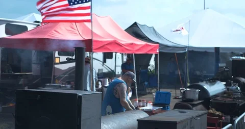 A row of tents at the Austin Rodeo BBQ C... | Stock Video | Pond5