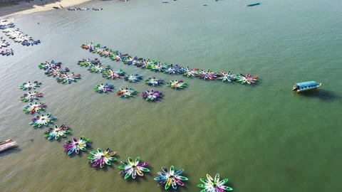 the rowers on canoe floating to shore at... | Stock Video | Pond5