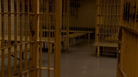 Rows of common area prison cells in jail... | Stock Video | Pond5