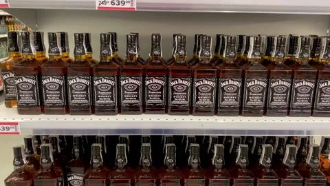 Rows of many bottles of Jack Daniel's lu... | Stock Video | Pond5