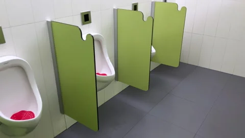 Rows of modern urinals with a sensor WC ... | Stock Video | Pond5