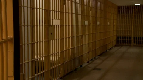 Rows of prison cells with large jail cel... | Stock Video | Pond5