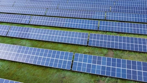 Rows of solar panels on power plant. Dro... | Stock Video | Pond5