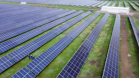 Rows of solar panels on power plant. Dro... | Stock Video | Pond5