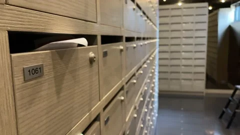 Rows of wooden mailboxes view inside mai... | Stock Video | Pond5