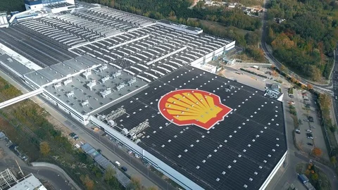 ROYAL DUTCH SHELL logo on a modern indus... | Stock Video | Pond5