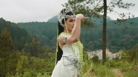 a royal princess standing around a volca... | Stock Video | Pond5