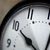 Rapidly spinning clock face on a green s... | Stock Video | Pond5