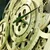 Rapidly spinning clock face on a green s... | Stock Video | Pond5