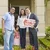 Real estate agent putting up sold sign | Stock Video | Pond5