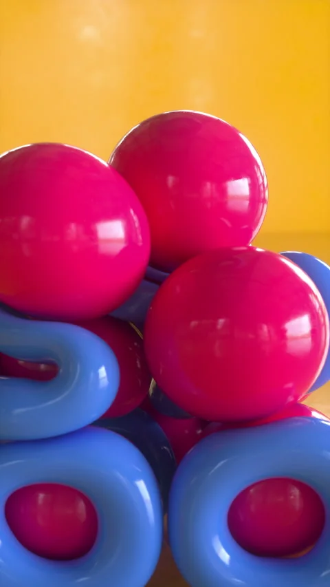 Rubber balls and rings falling in heap o... | Stock Video | Pond5