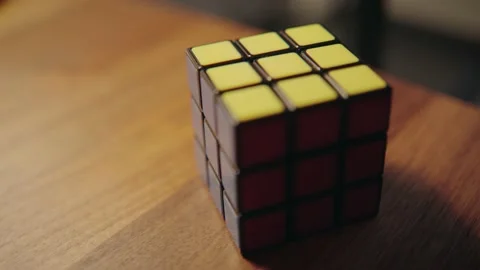 Rubik’s Cube on wooden desk top, close... | Stock Video | Pond5
