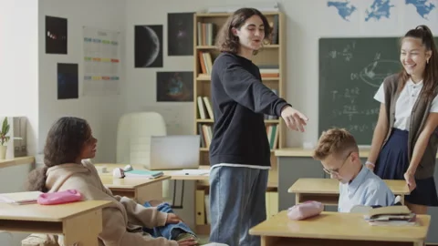 Rude Teenagers Teasing Their Classmate | Stock Video | Pond5
