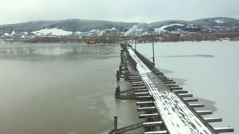 Ruined pedestrian wooden bridge | Stock Video | Pond5