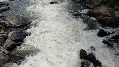 Rumbling water dark slippery shore water... | Stock Video | Pond5