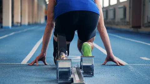 A runner with prosthetic leg training, b... | Stock Video | Pond5