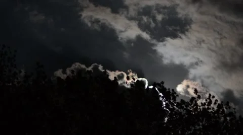 Running clouds at night under the moonli... | Stock Video | Pond5