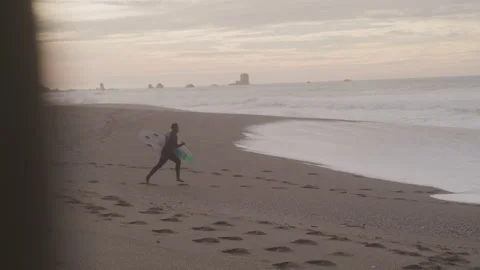 Running Surfer On Beach | Stock Video | Pond5
