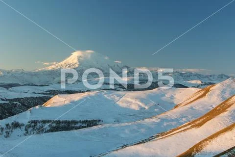 Russia. The formation and movement of clouds above the volcano Elbrus ...