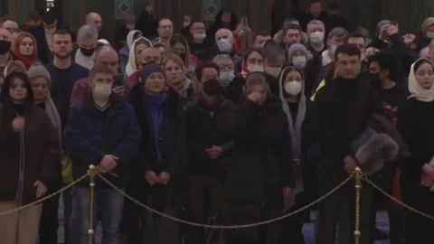 Russian army - Crowds of people praying ... | Stock Video | Pond5