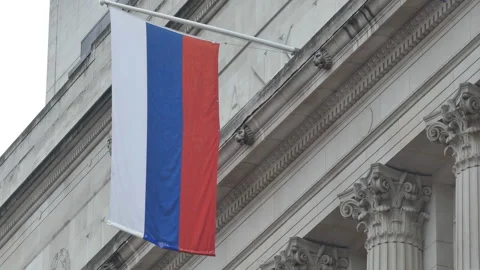 The Russian flag hanging from a building... | Stock Video | Pond5