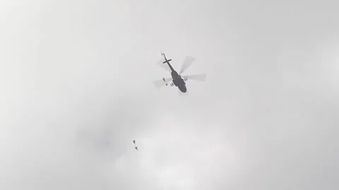 A Russian military helicopter dropping a... | Stock Video | Pond5
