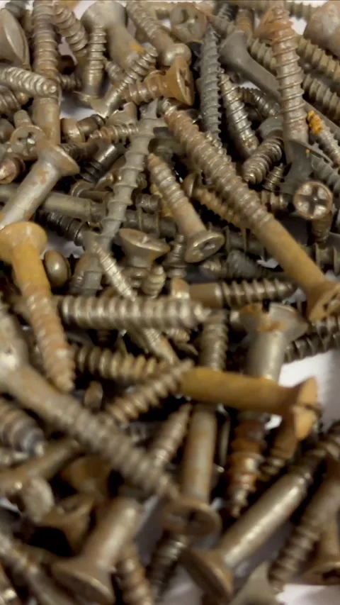 a rusted screws pile rusty spinning vide... | Stock Video | Pond5