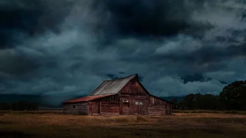 Rustic barn on farm in summer thundersto... | Stock Video | Pond5