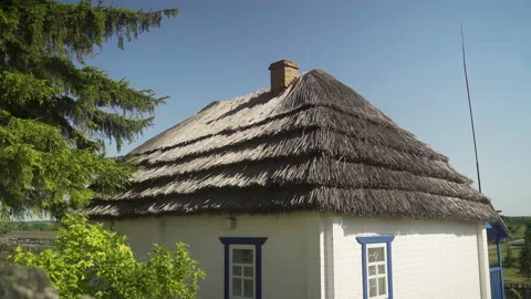 A rustic house with a chimney and white ... | Stock Video | Pond5