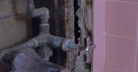 Rustic plumbing pipe / knob with opened ... | Stock Video | Pond5