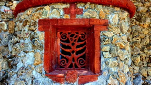Rustic redstone arched window in Greek m... | Stock Video | Pond5
