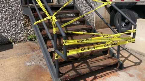 Rusty Metal Steps with Yellow Caution Ta... | Stock Video | Pond5