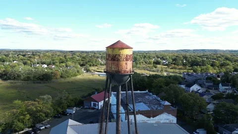 Rusty Water Tower Aerial Shot Reversing ... | Stock Video | Pond5