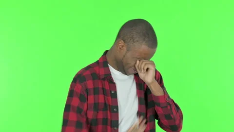 Sad African Man Crying on Green Backgrou... | Stock Video | Pond5