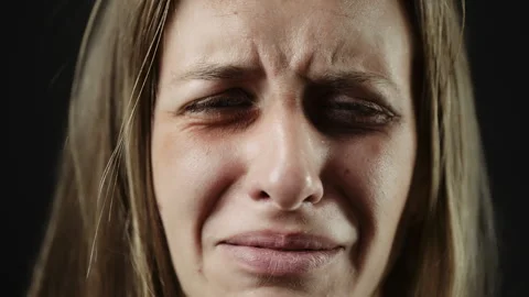 A sad beaten up woman with tear in eye a... | Stock Video | Pond5