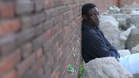 sad black immigrant alone in the city - ... | Stock Video | Pond5