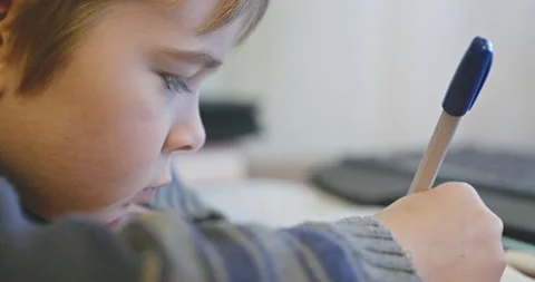 Sad Child Boy Study at Home. Kid Write ... | Stock Video | Pond5