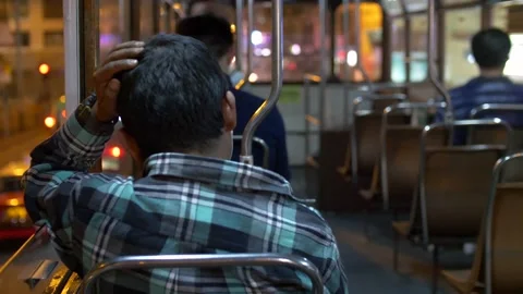 Sad Chinese man from behind on a bus scr... | Stock Video | Pond5