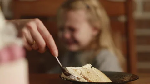 Sad cute birthday girl refuses to eat he... | Stock Video | Pond5