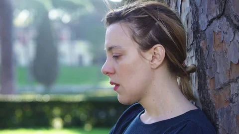 sad depressed woman's profile crying- ou... | Stock Video | Pond5