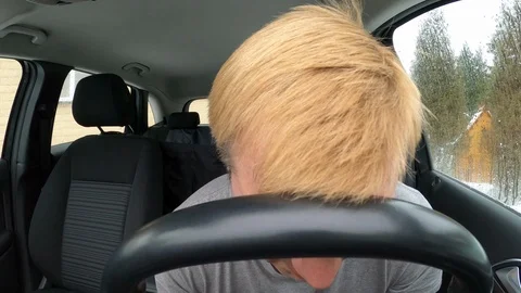 Sad desperate man crying in a car while ... | Stock Video | Pond5