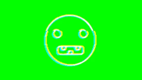 Sad emoticon with glitch effect on green... | Stock Video | Pond5