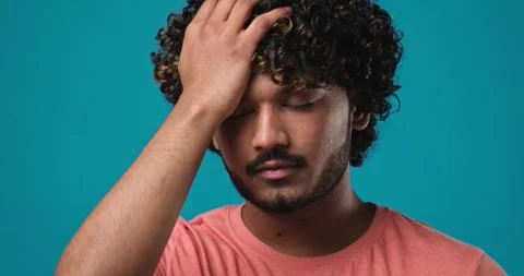 sad frustrated indian looking at camera ... | Stock Video | Pond5