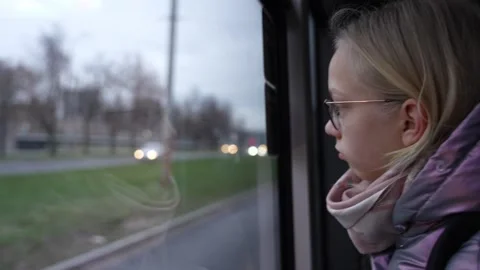 Sad girl driving to school with bus. Tee... | Stock Video | Pond5