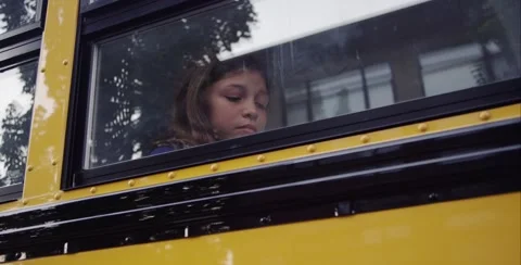 sad girl on school bus alone | Stock Video | Pond5