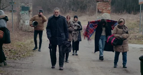 Sad Homeless Refugees Walking While Migr... | Stock Video | Pond5