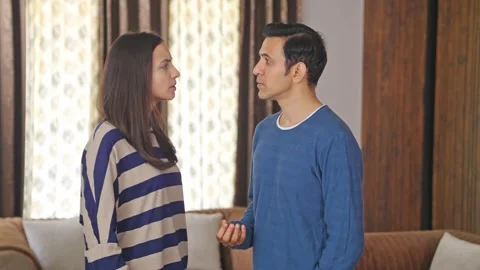 Sad Indian couple talking with each othe... | Stock Video | Pond5