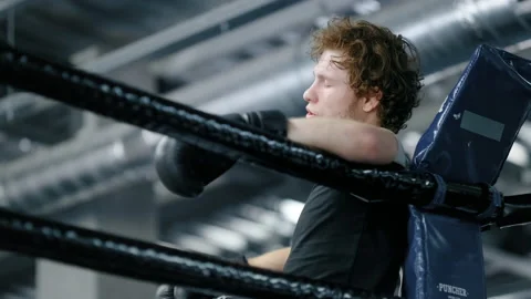Sad kickboxer losing fight at gym. Upset... | Stock Video | Pond5