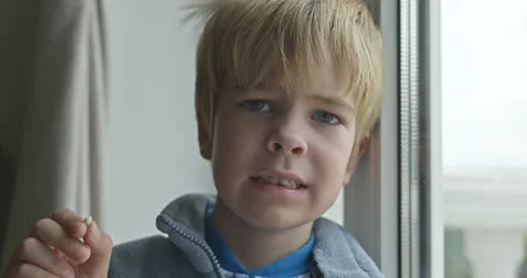 Sad Kid Holds in Hand Baby Tooth Upset B... | Stock Video | Pond5
